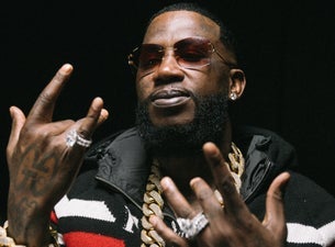 Gucci Mane Holding Guns